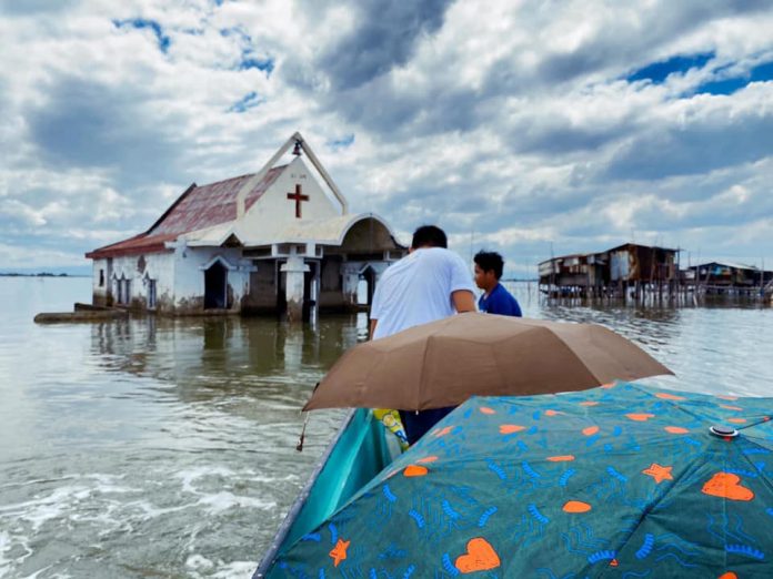 Priest celebrates Mass in flooded chapel amid pandemic | Catholic News ...