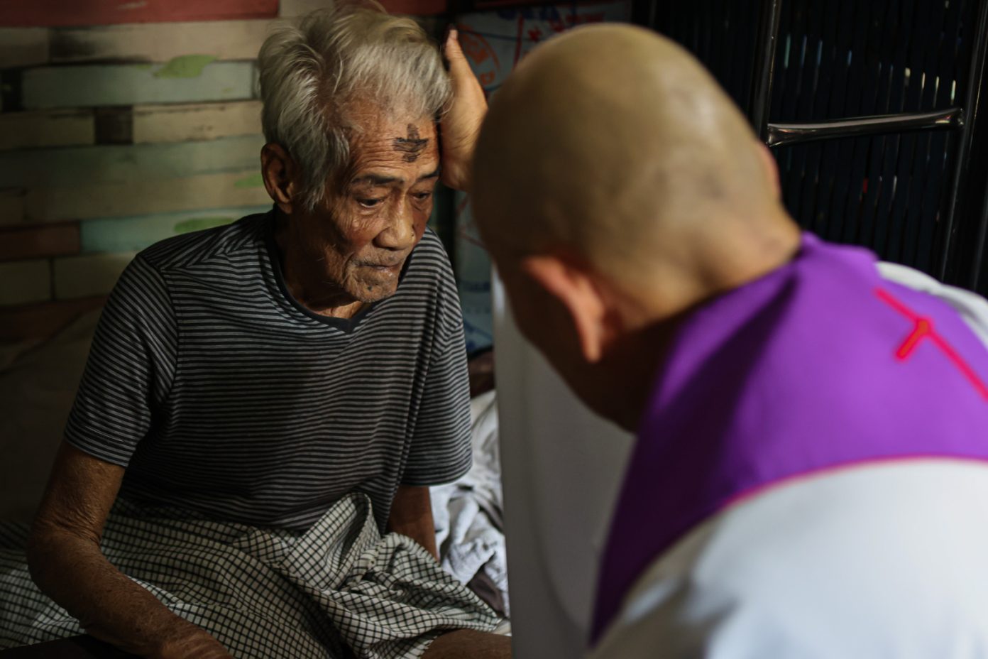 Photos: ‘Running Priest’ visits sick, elderly on Ash Wednesday ...