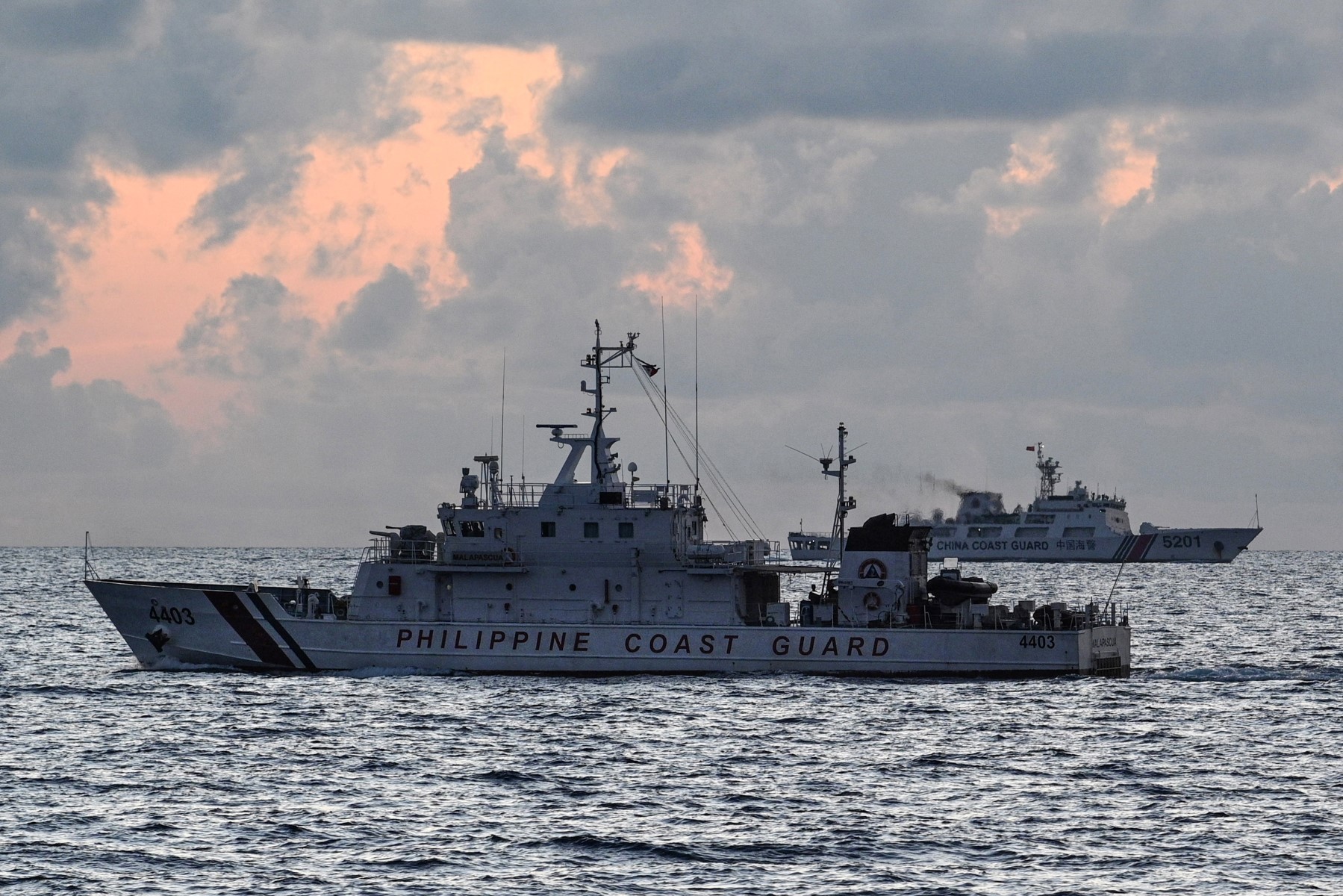 Chinese, Philippine vessels in 'David and Goliath' near-crash ...