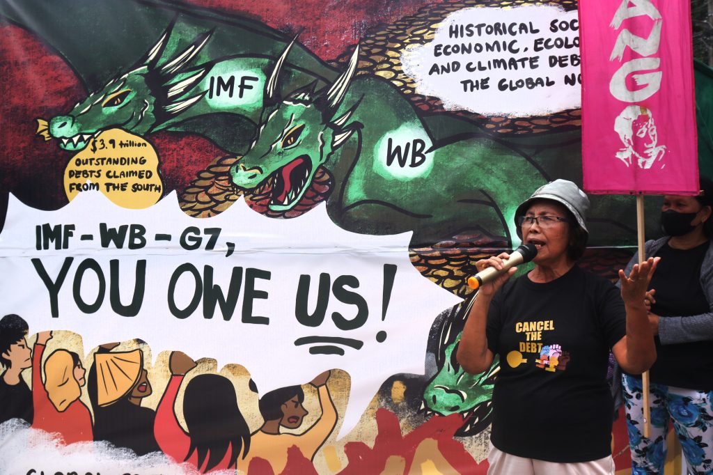 IN PHOTOS: Activists rally for debt cancellation, climate justice, and ...