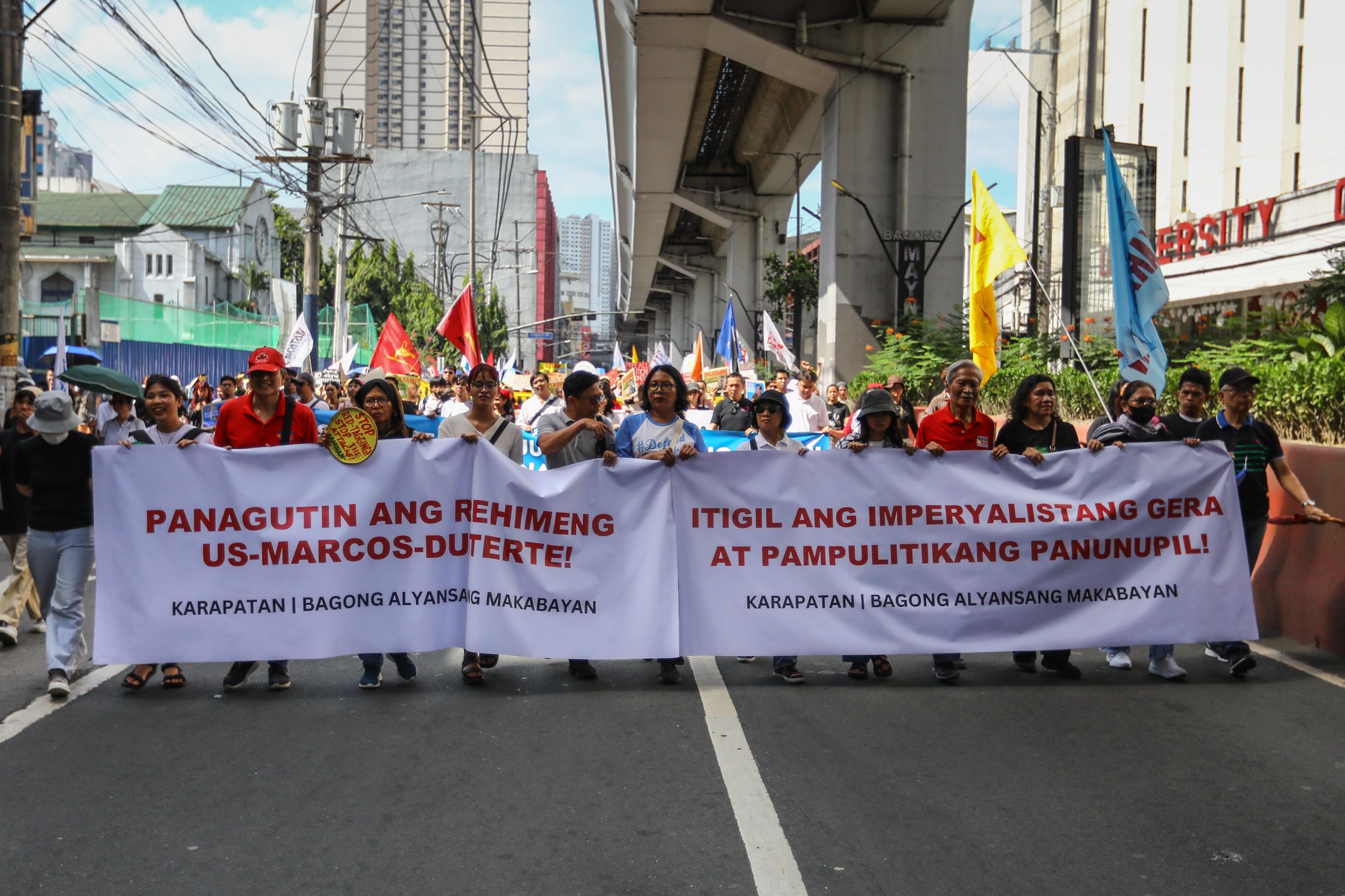 IN PHOTOS: Activists decry government abuses, global injustices on 75th ...