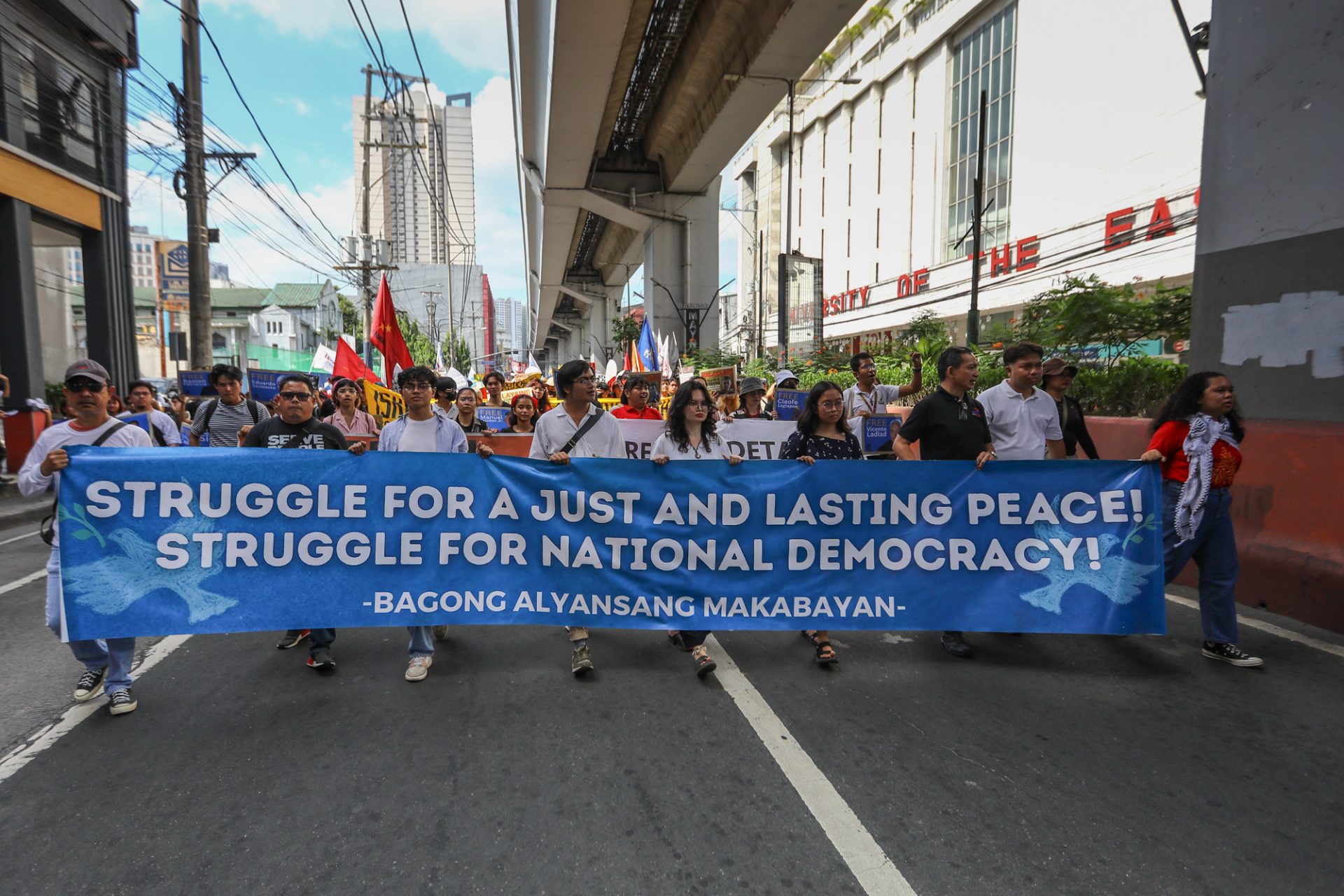 IN PHOTOS: Activists decry government abuses, global injustices on 75th ...